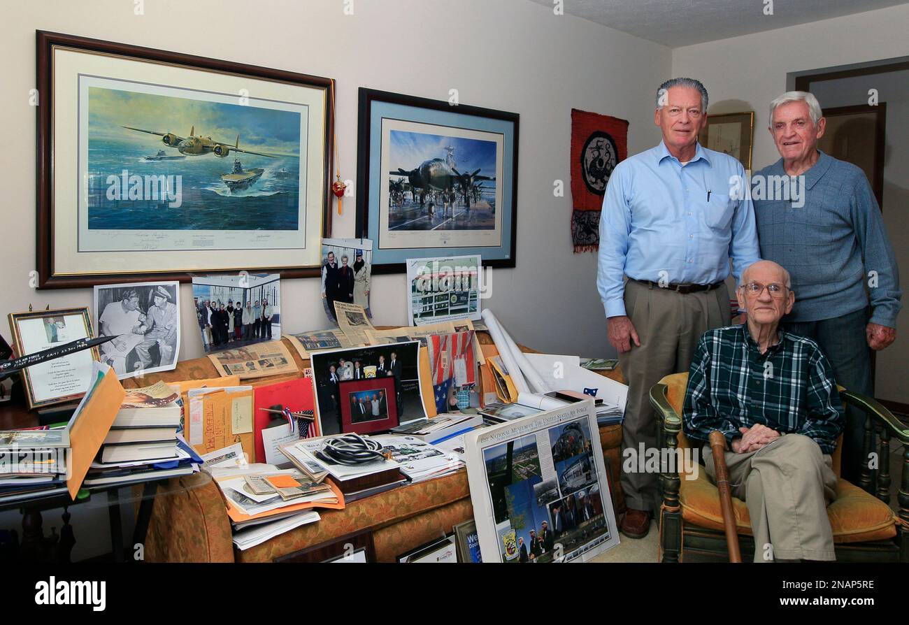 In this Dec. 1, 2011 photo, Maj. Thomas Griffin, seated, poses next to ...