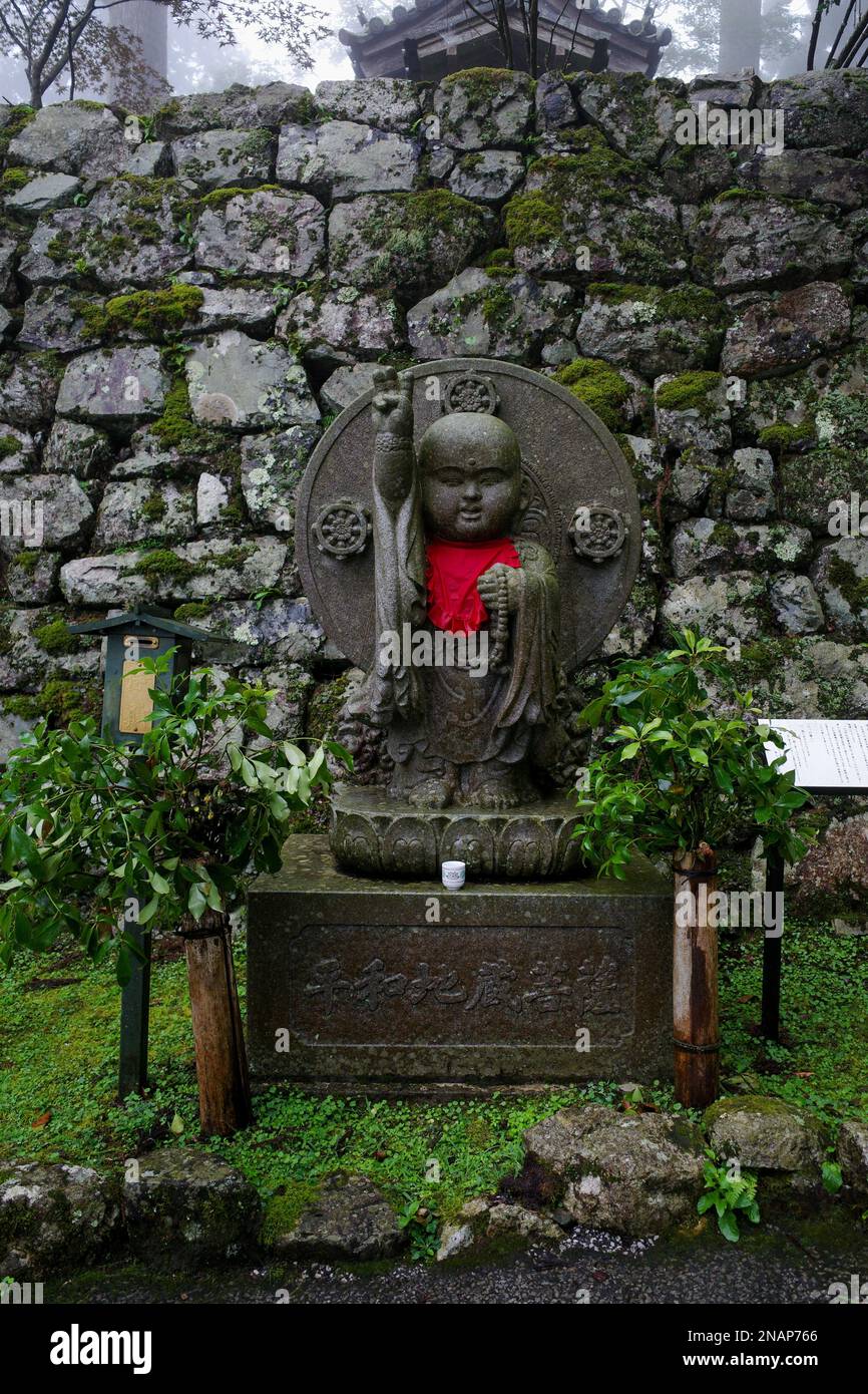 The Japanese Jizo statue in the park Stock Photo - Alamy