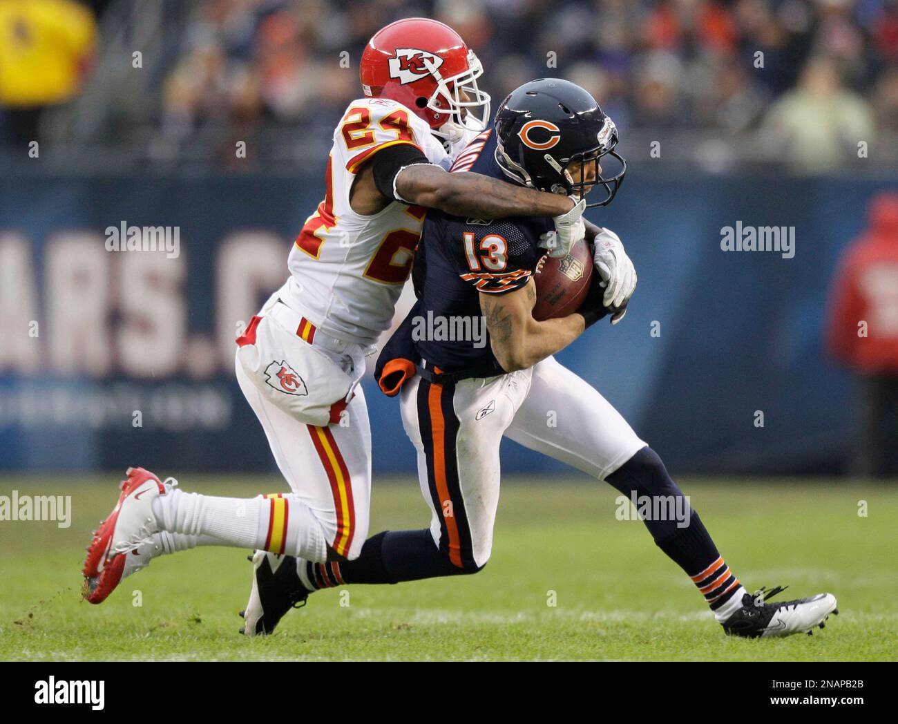 Chicago Bears wide receiver Johnny Knox (13) is tackled by Kansas City ...