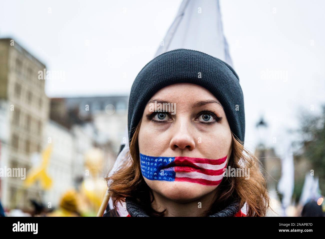 Woman 'gagged' with painted American flag, Supporters of WikiLeaks ...