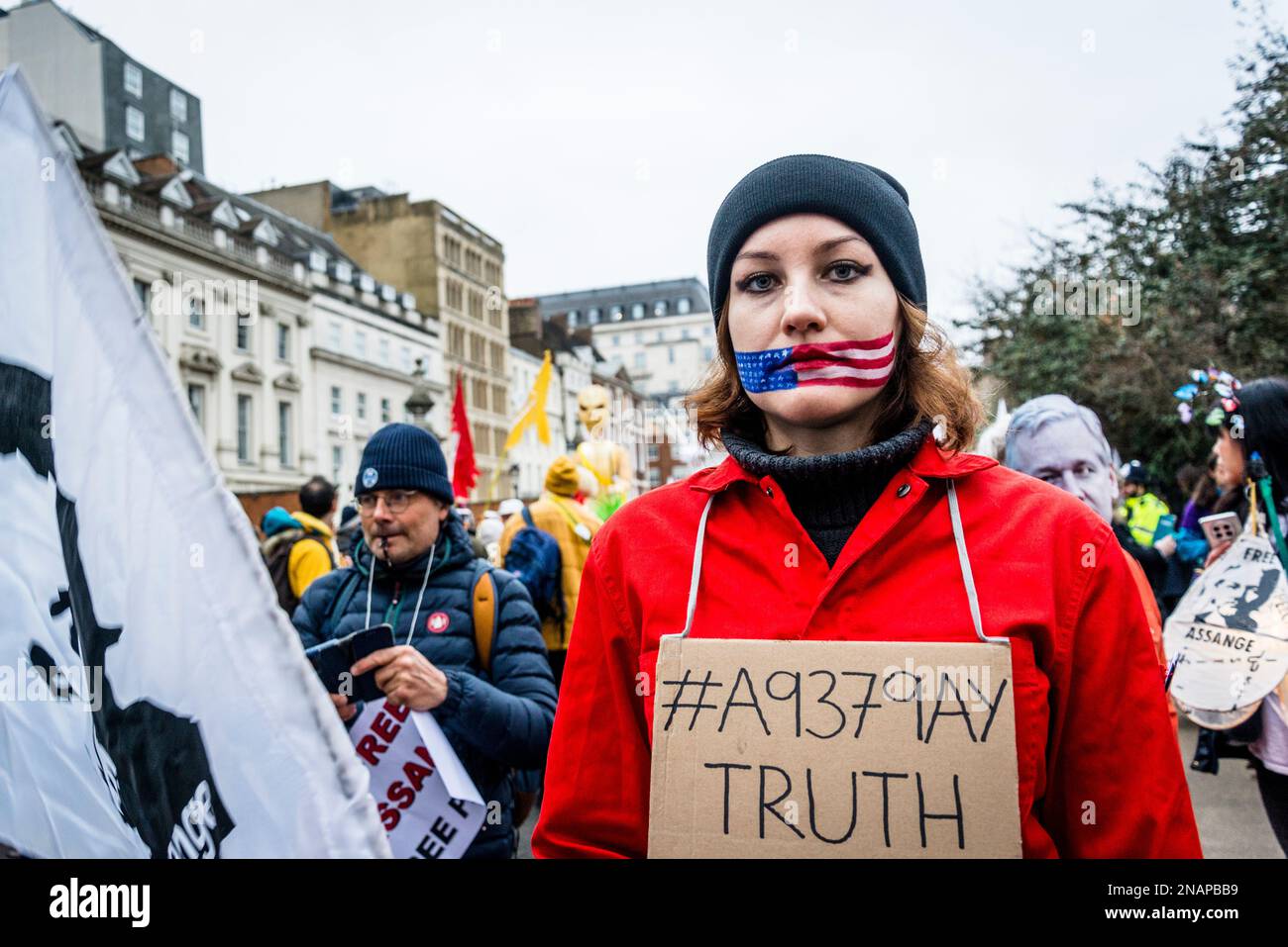 Woman 'gagged' with painted American flag, Supporters of WikiLeaks ...