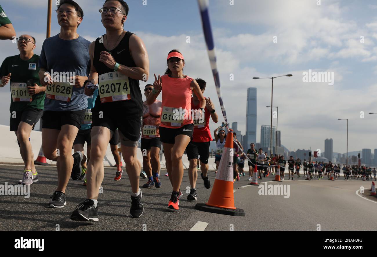 Runners of Standard Chartered Hong Kong Marathon 2021 pass West Harbour ...
