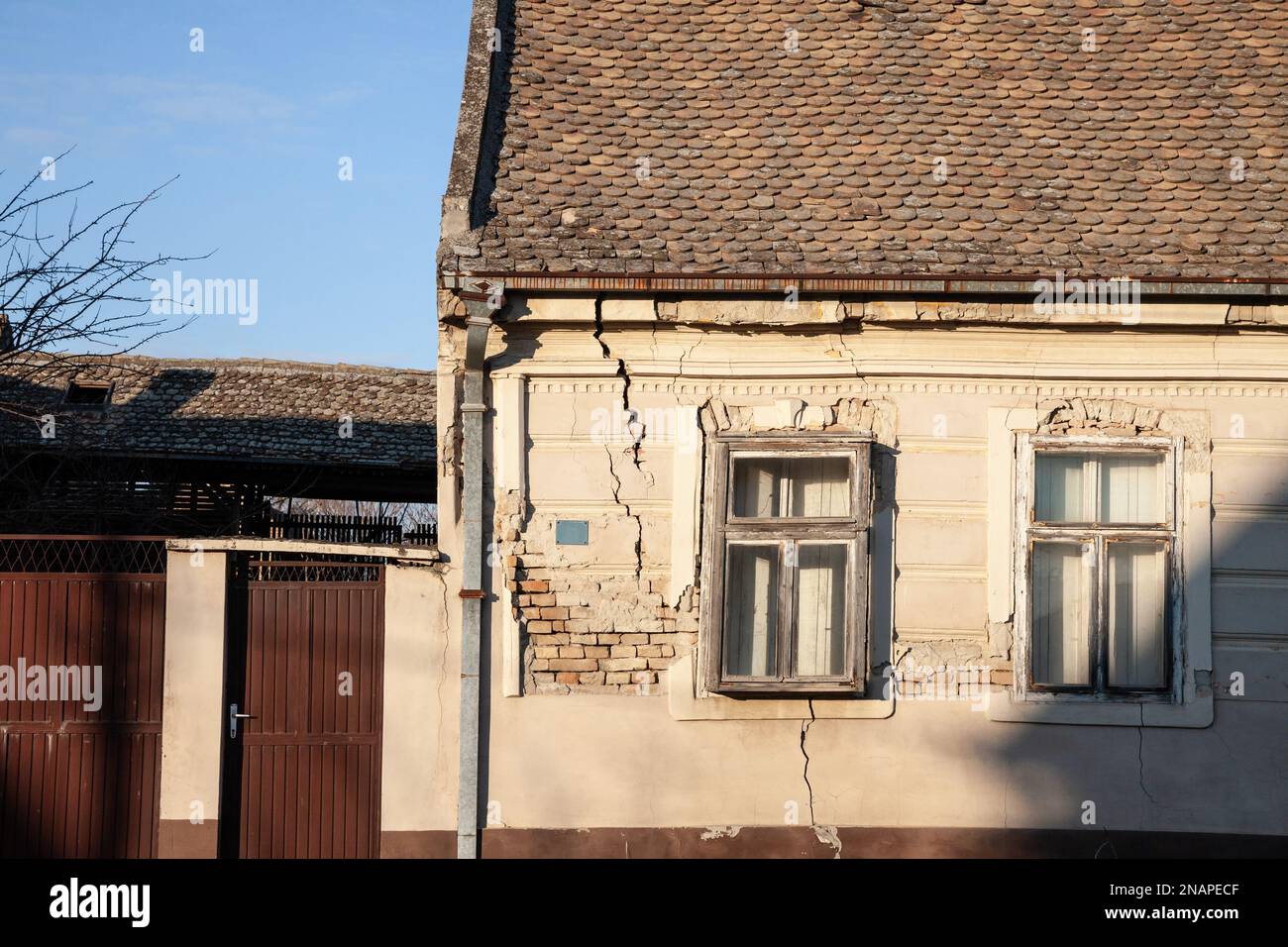 Picture of a facade cracked with a use crack in diagonal, threatening ...