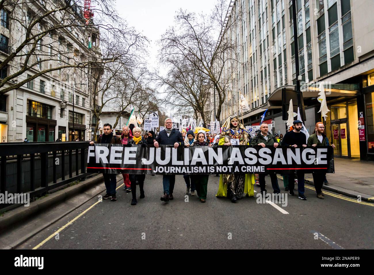 Supporters of WikiLeaks founder Julian Assange hold a 'Night Carnaval ...