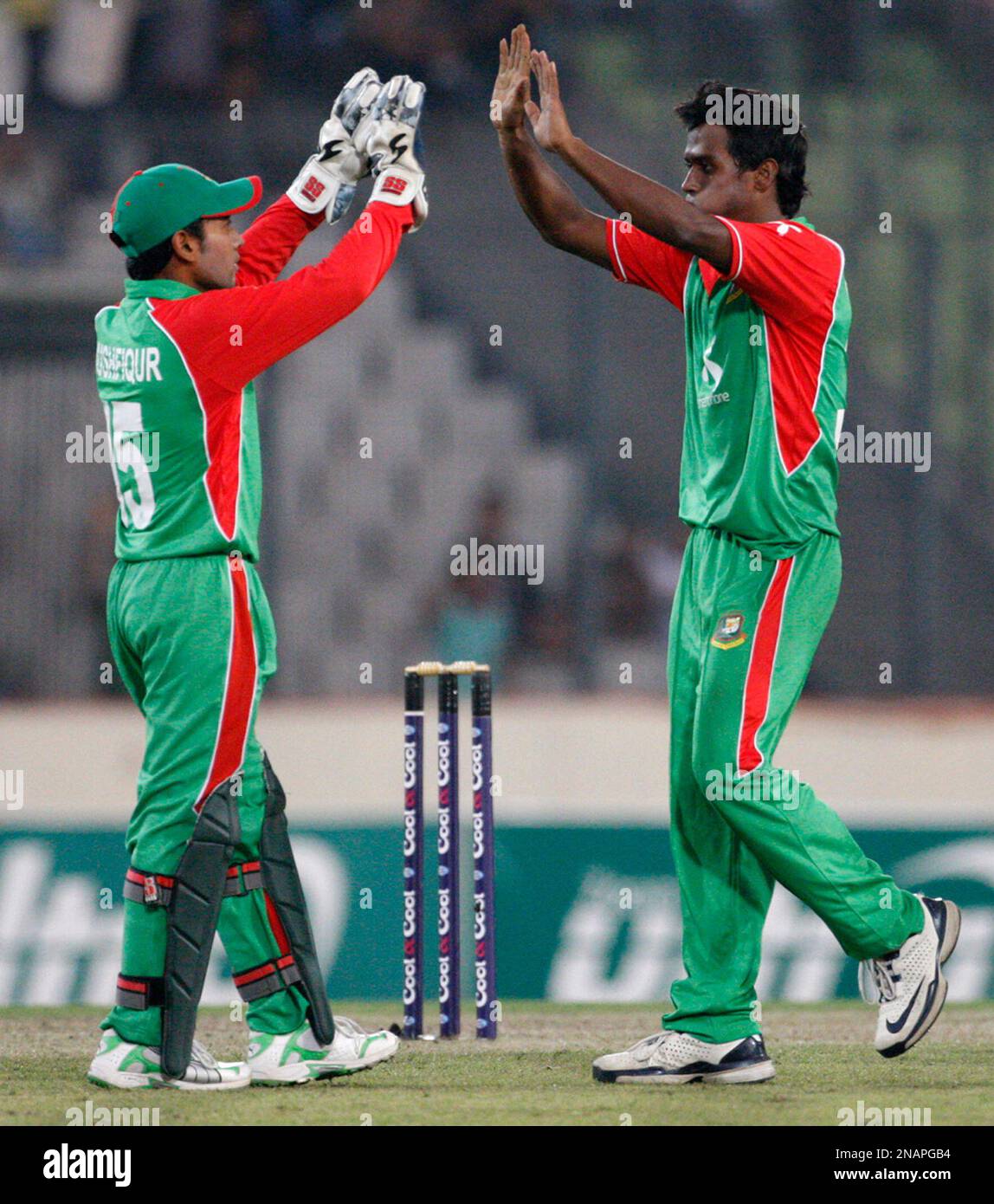 Bangladesh's Mushfiqur Rahim, left, greets Rubel Hossain after the ...
