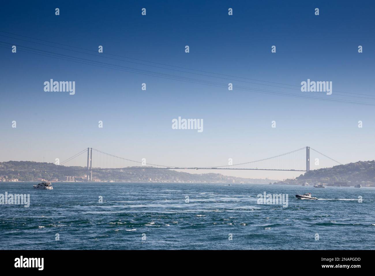 Picture of the Istanbul Bosphorus bridge seen from afar during a sunny ...