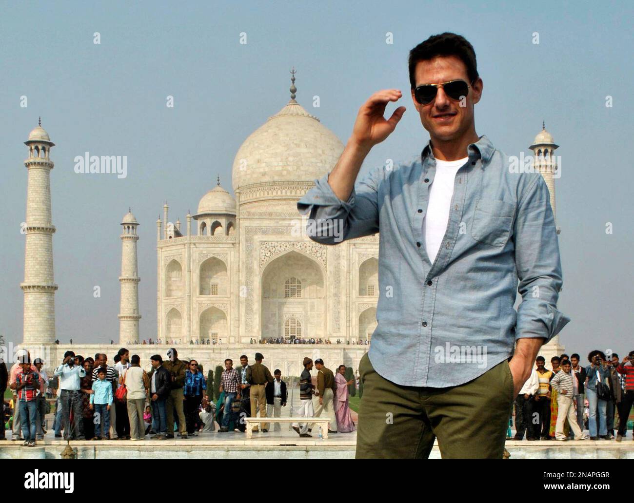 Hollywood star Tom Cruise poses in front of the landmark Taj Mahal in ...