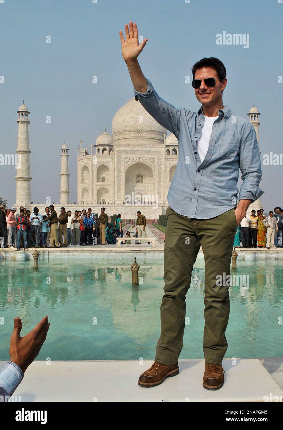 Hollywood star Tom Cruise poses in front of the landmark Taj Mahal in ...
