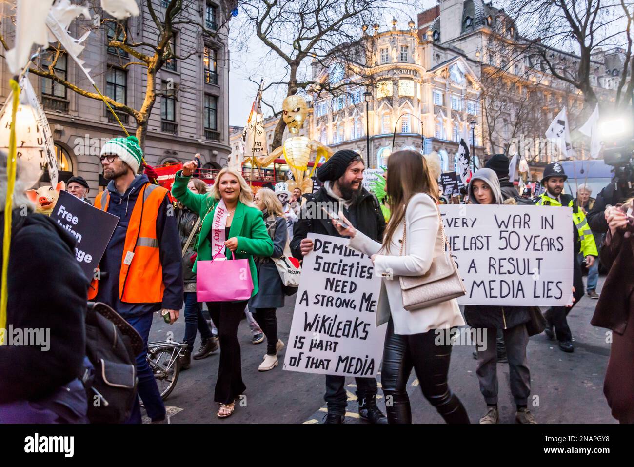 Supporters of WikiLeaks founder Julian Assange hold a 'Night Carnaval ...