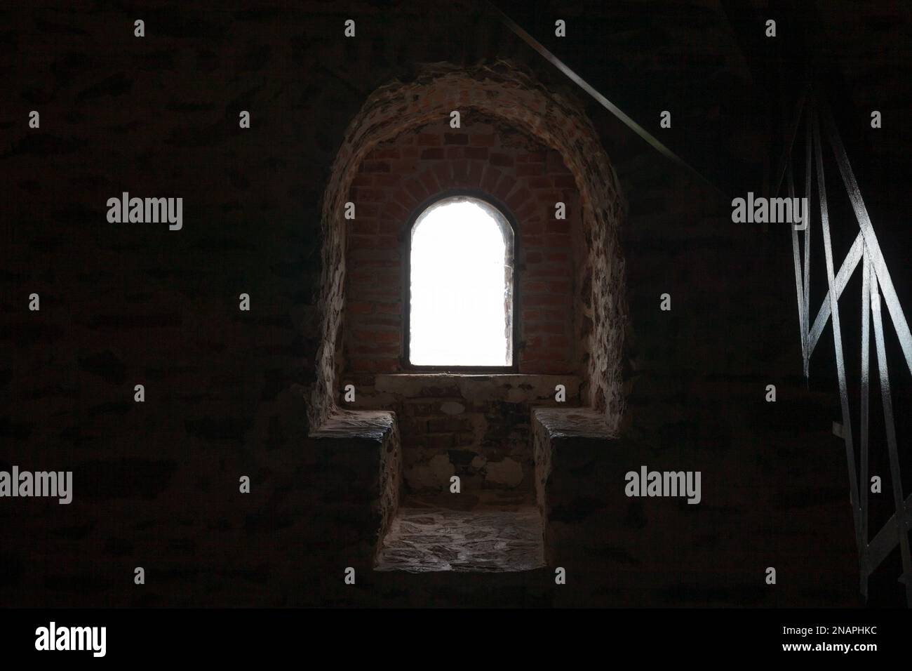 Picture of a stone window fram with a window seat in a middle age ...