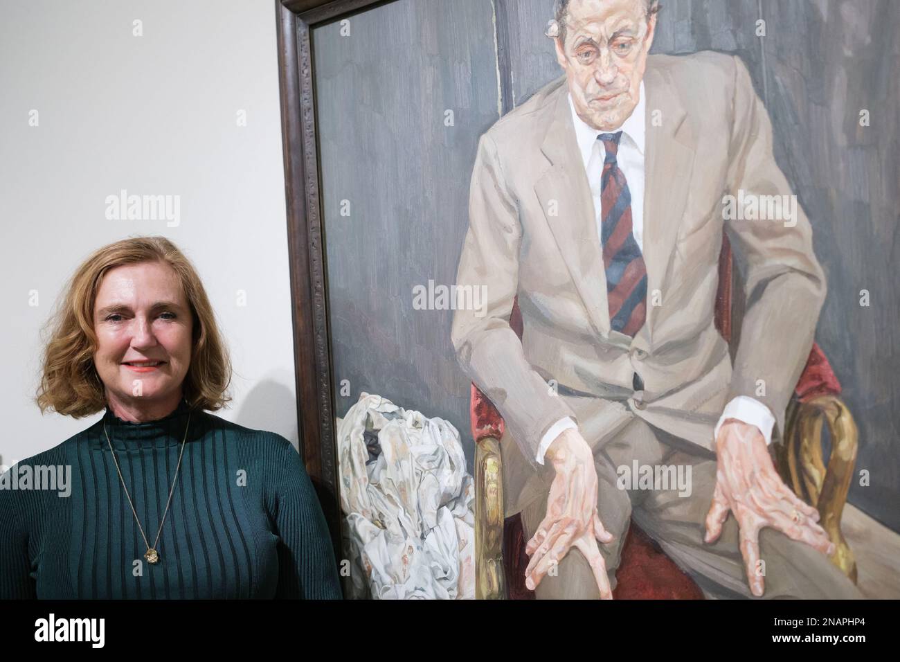 Francesca Thyssen-Bornemisza poses next to the painting "man in a chair ...