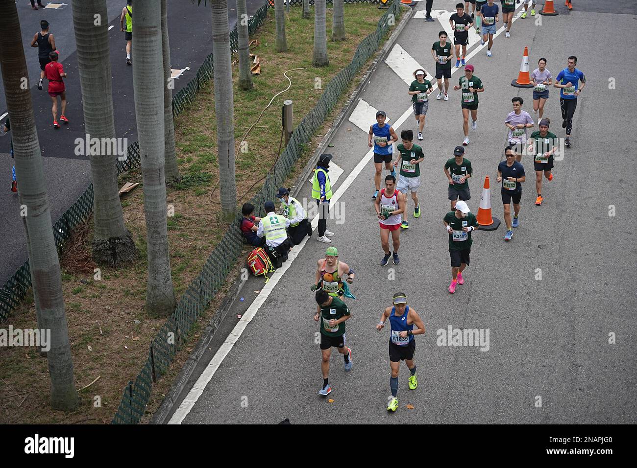 A runner receives medical treatment near Central Ferry Pier during the ...