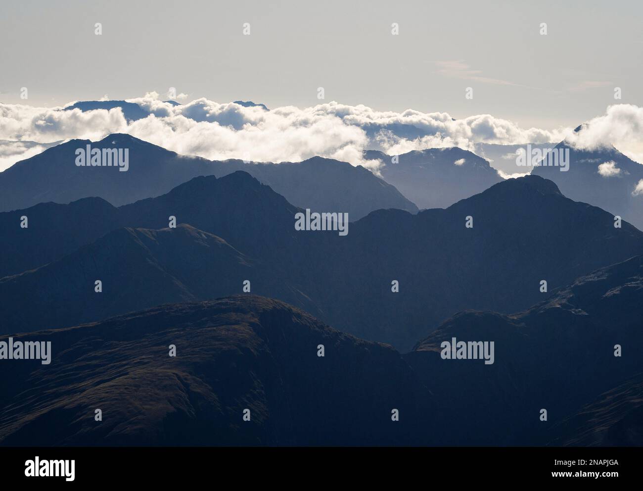 Alpine mountain silhouette layers, nature landscape panorama seen from Mount Armstrong Brewster ...