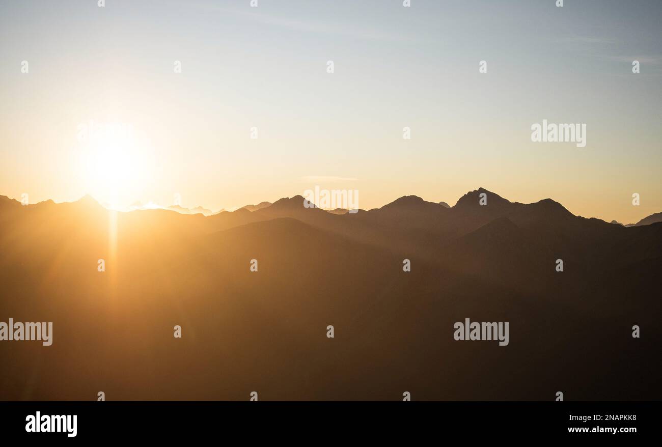 Alpine sunset mountain silhouette layers, nature landscape panorama ...