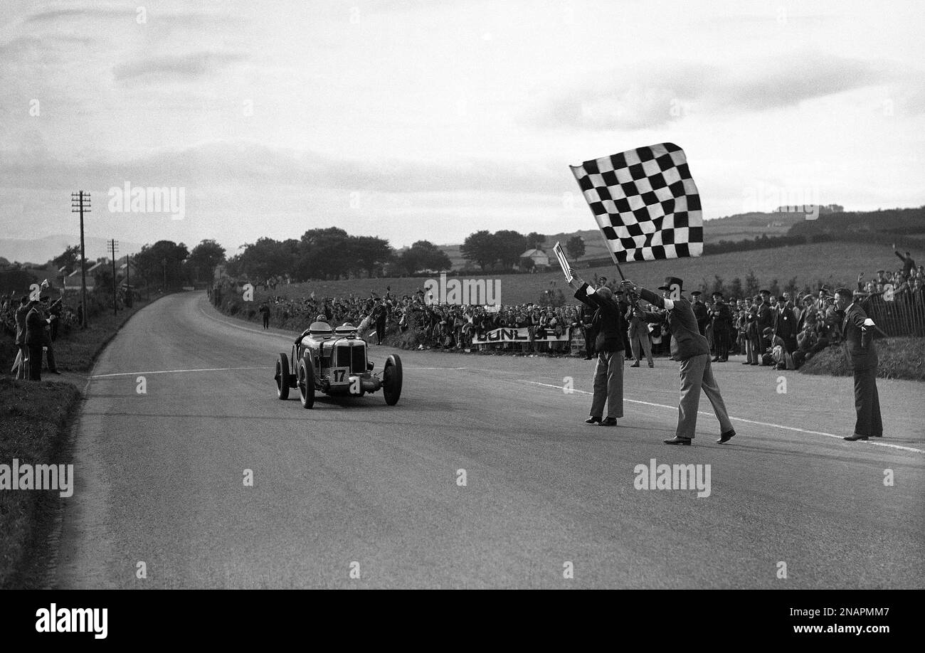 Tazio Giorgio Nuvolari driving a British M.G. Magnette towards the ...