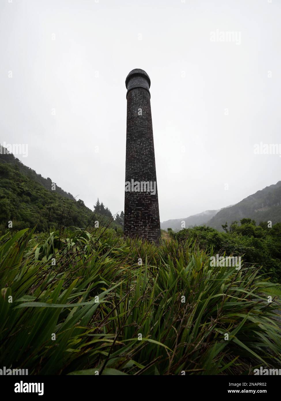 Vertical shaft coal mining industry chimney of Tyneside Mine, Brunner ...