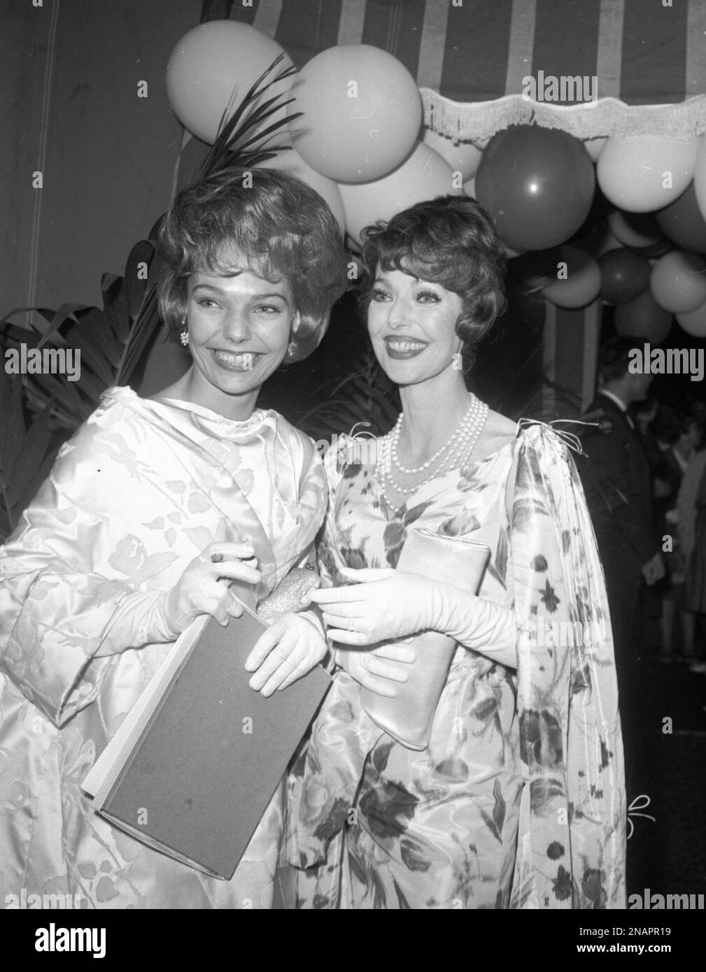 FILE - In this May 16, 1961 file photo, actress Loretta Young, right ...