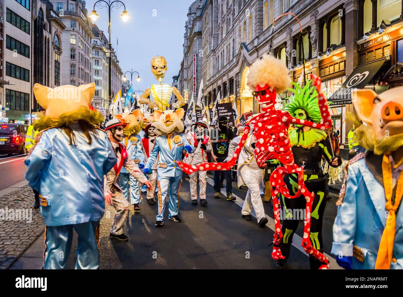 Dancing pigs and death, Supporters of WikiLeaks founder Julian Assange ...