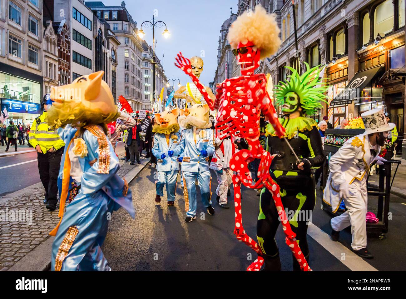 Dancing pigs and death, Supporters of WikiLeaks founder Julian Assange ...