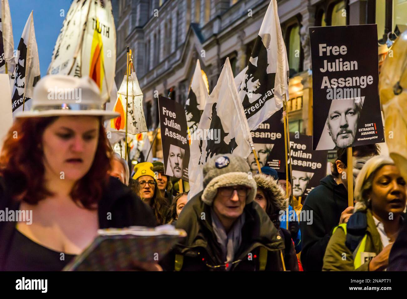 Supporters of WikiLeaks founder Julian Assange hold a 'Night Carnaval ...