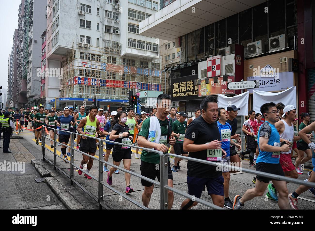 Hong Kong, China. 12th Feb, 2023. Participants run along Nathan Road ...