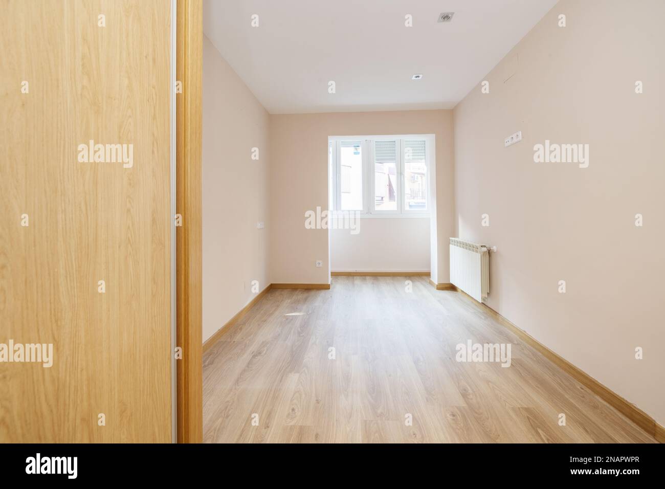 Empty living room with the space of a terrace gained from the room with ...