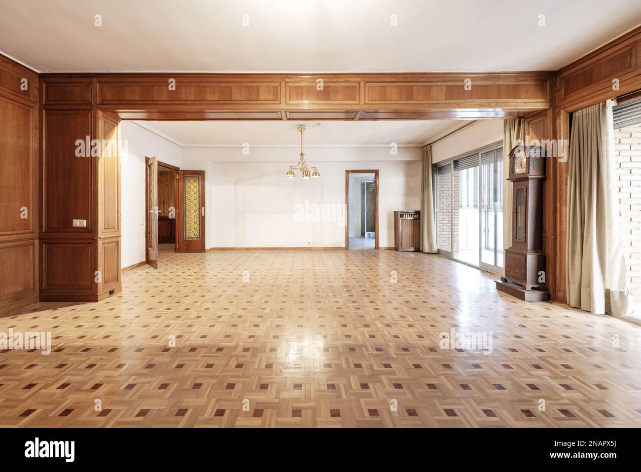 Large living room of a house with wooden parquet floors of various ...