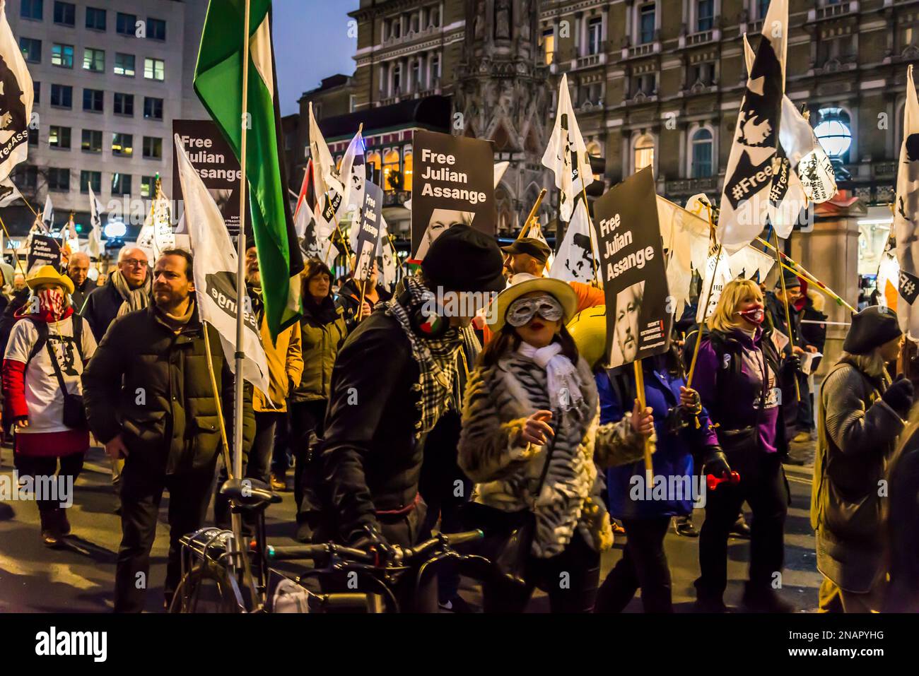 Supporters of WikiLeaks founder Julian Assange hold a 'Night Carnaval ...