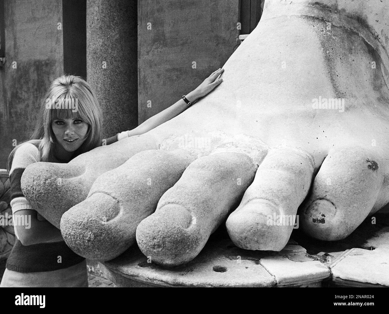 Swedish-born actress Britt Ekland poses at a huge marble foot, believed ...