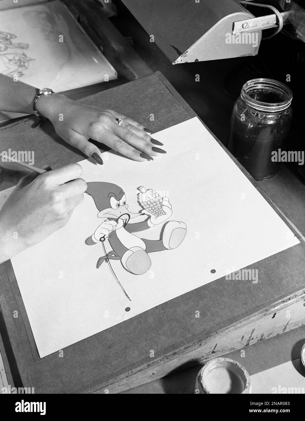 Georgette Jean works on a drawing of Woody Woodpecker, beloved ...