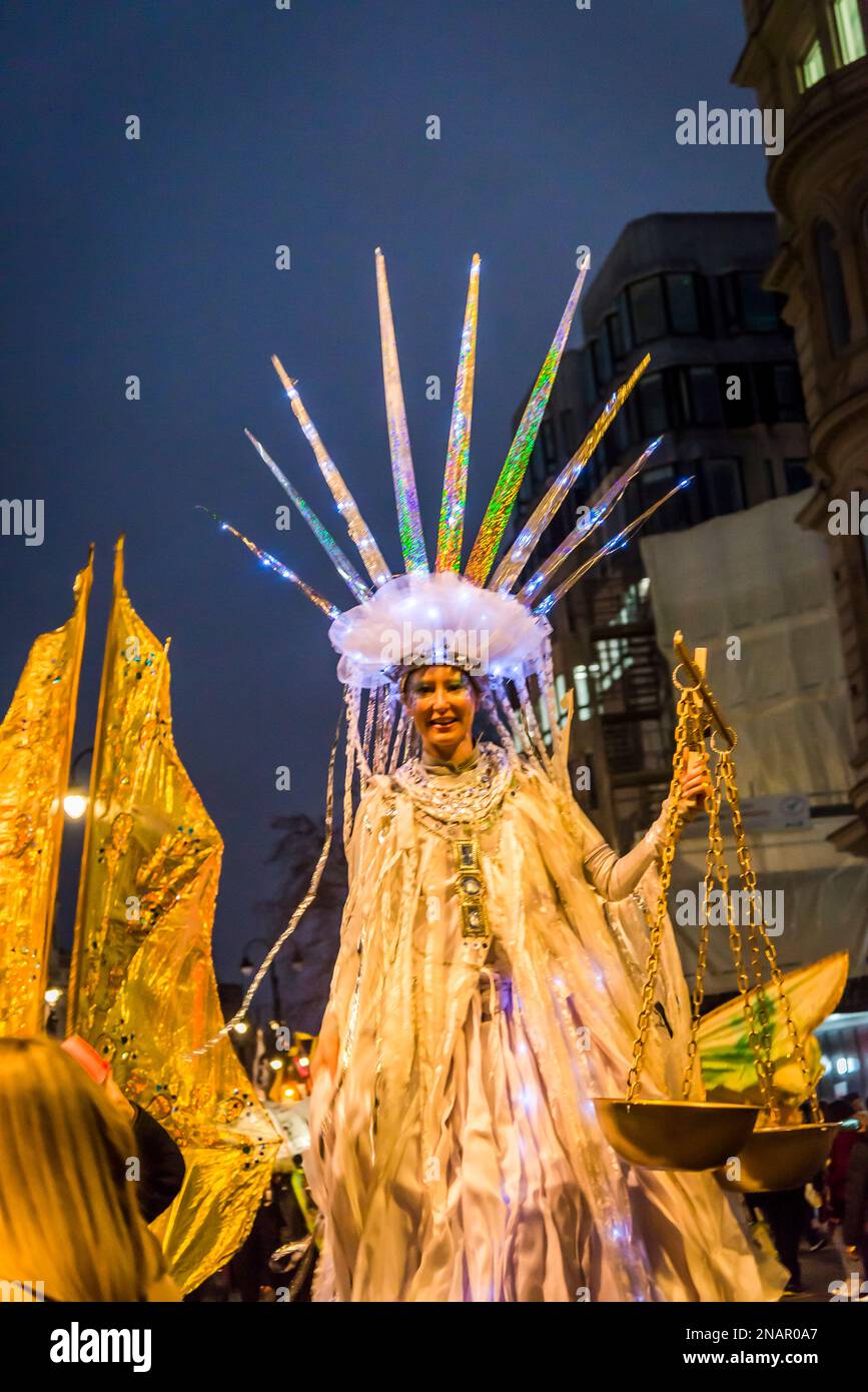 Impersonation of Statue of Liberty with scales of justice, Supporters ...