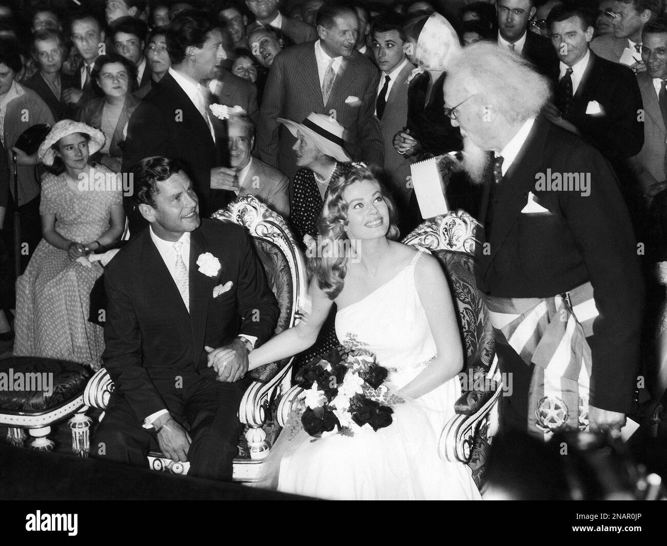 English actor Anthony Steel and Swedish actress Anita Ekberg talk with ...