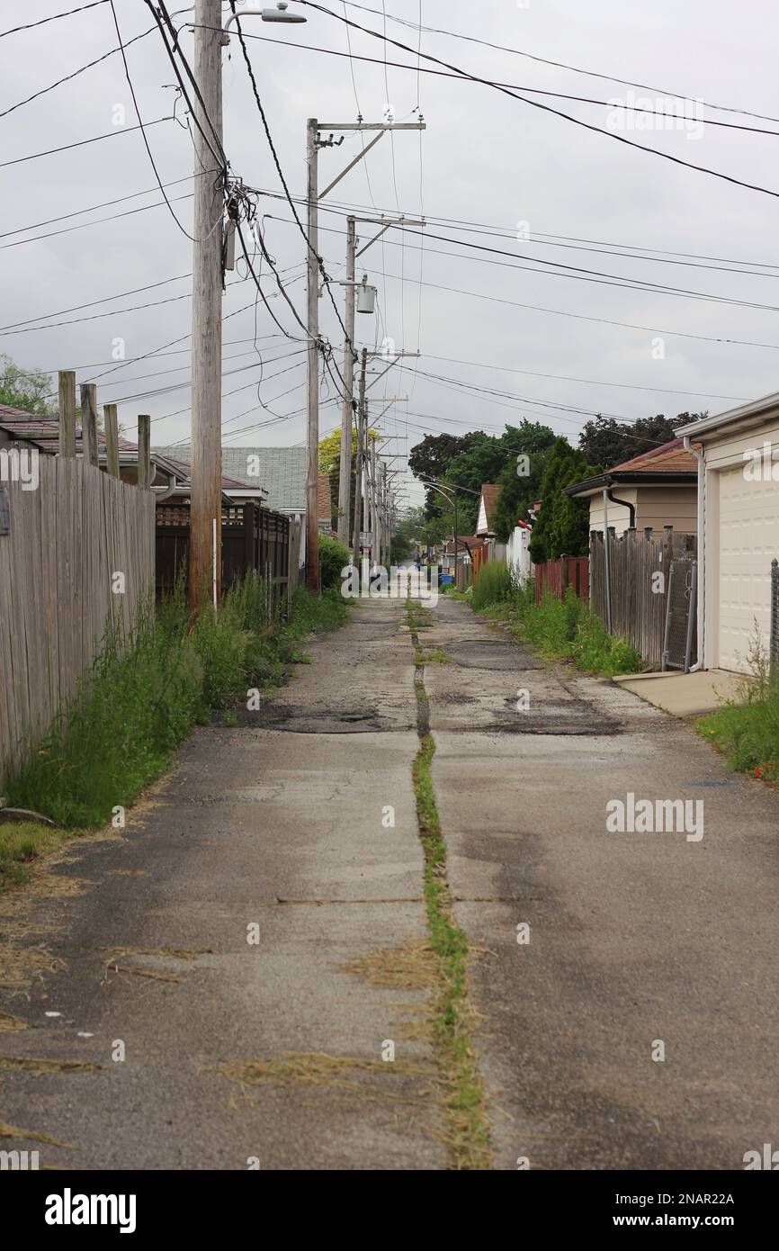 Typical common back alley of an urban residential street Stock Photo ...