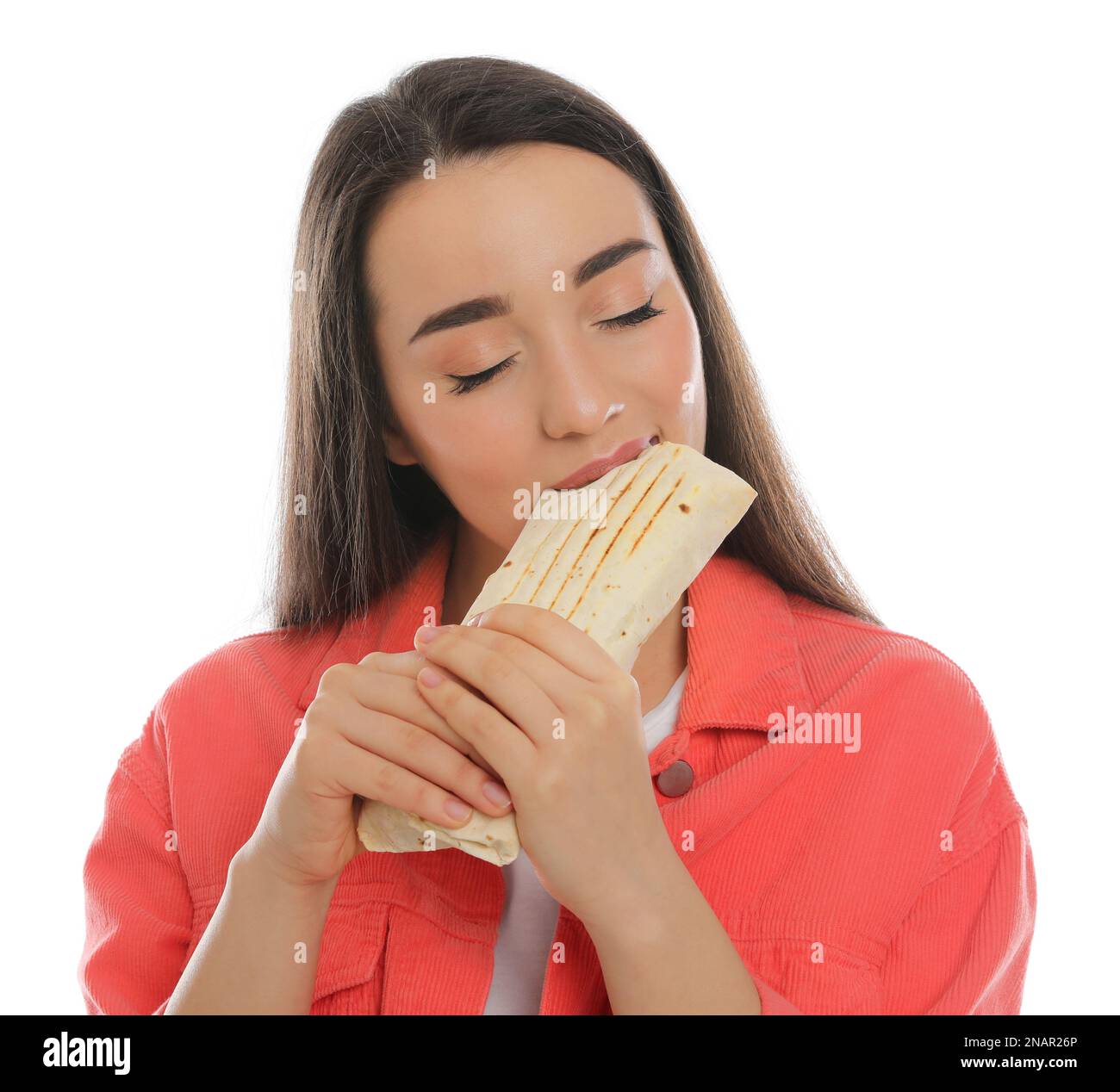 Young woman eating tasty shawarma isolated on white Stock Photo - Alamy