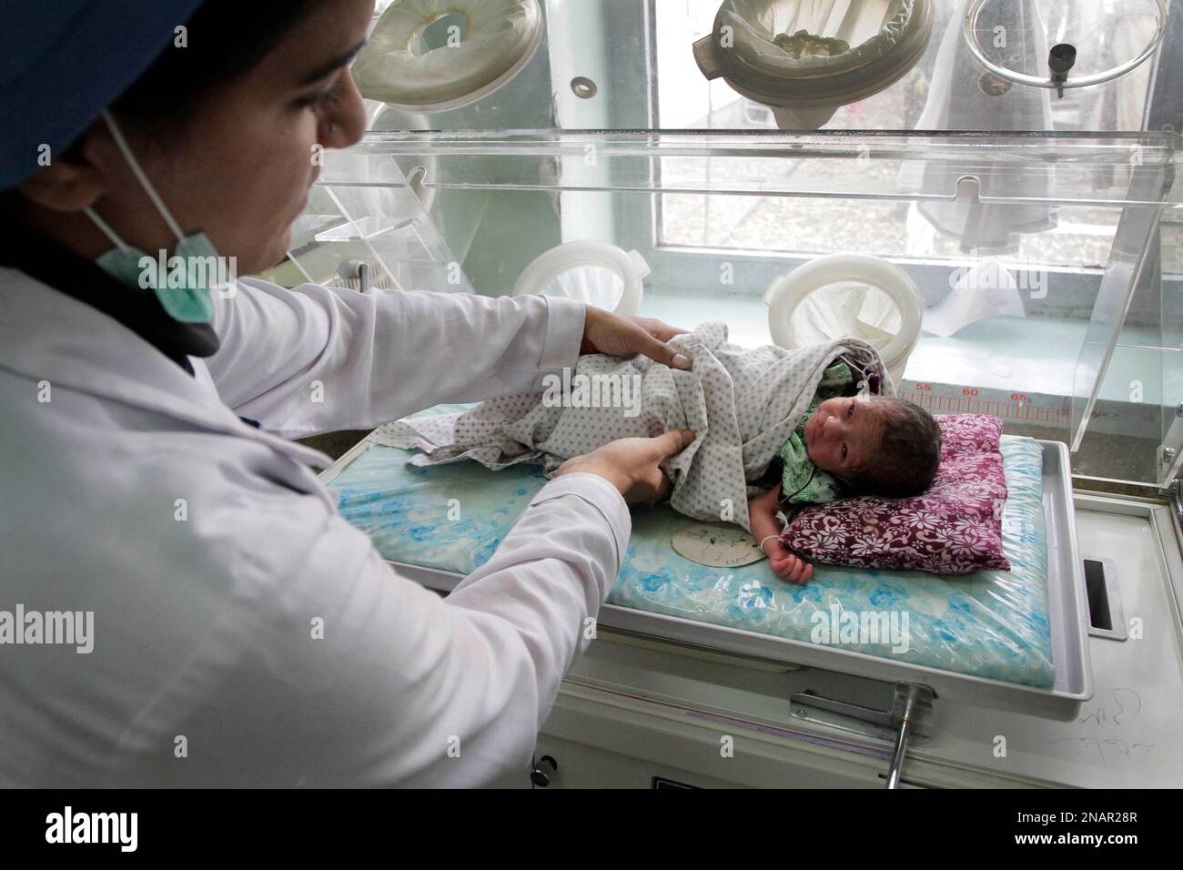 In this photo taken on Tuesday, Nov. 29, 2011, Afghan doctor Nafisa ...