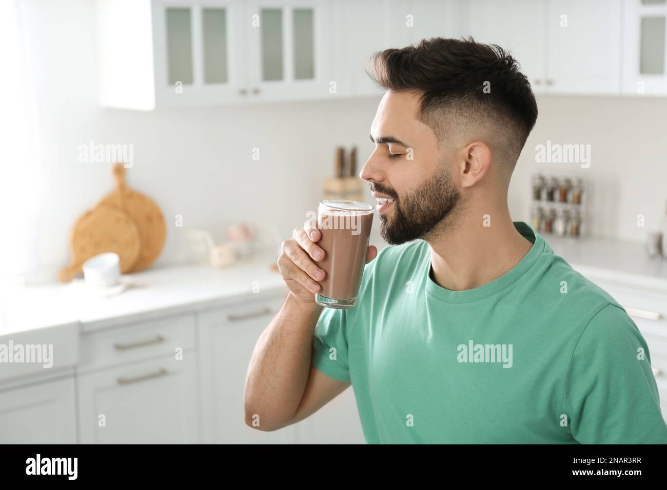 Man drinking milkshake hi-res stock photography and images - Alamy