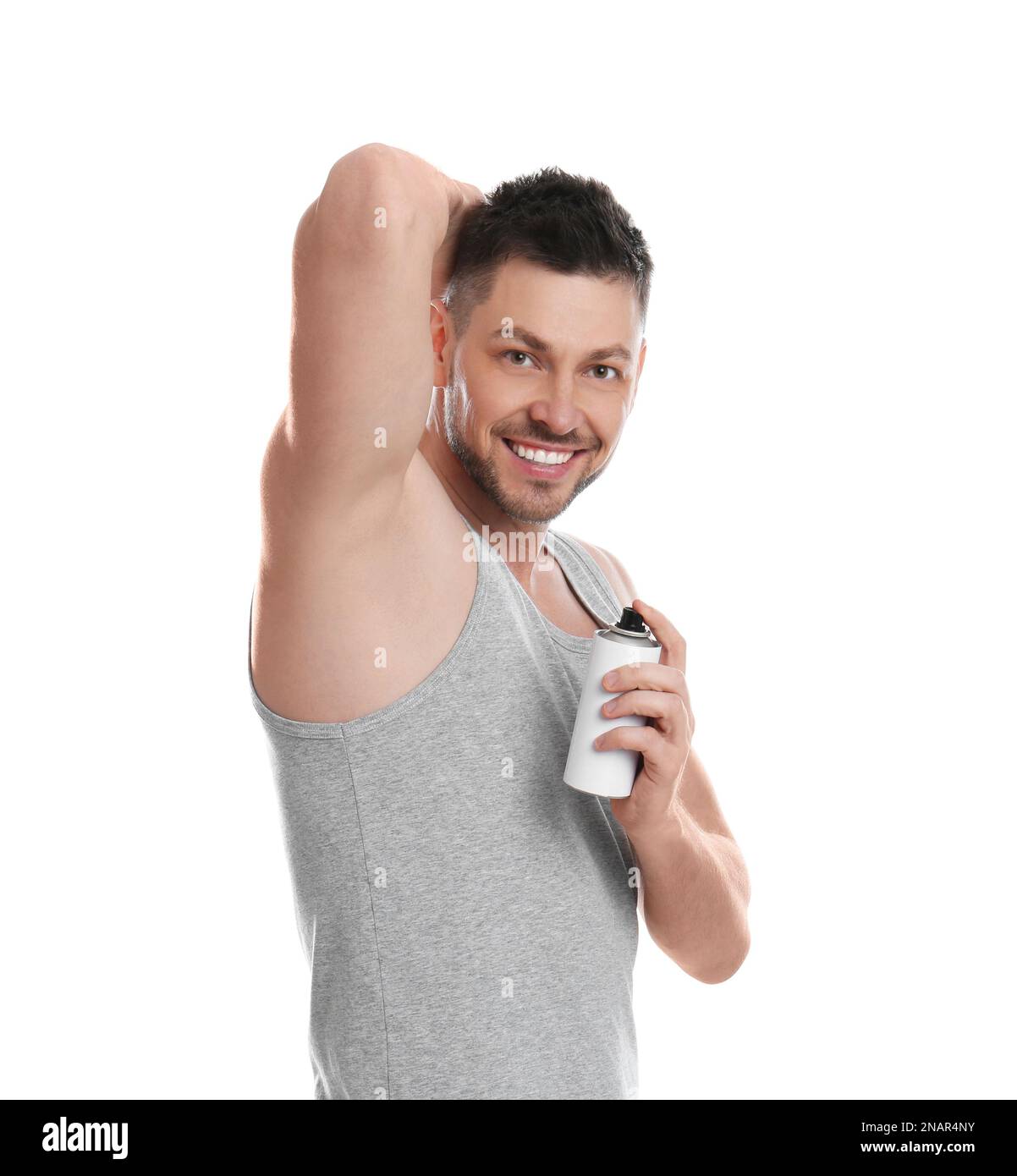 Handsome man applying deodorant isolated on white Stock Photo - Alamy