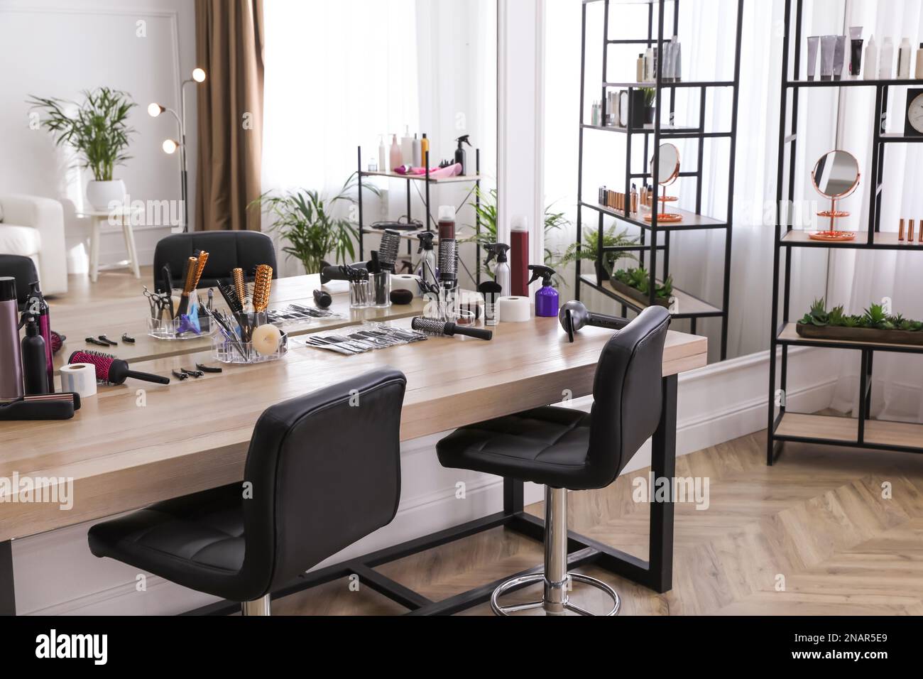 Stylish beauty salon interior with hairdresser's workplace Stock Photo ...