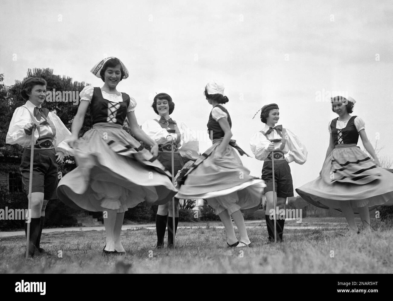 These pretty lasses at Meredith College, Raleigh, North Carolina, twirl ...