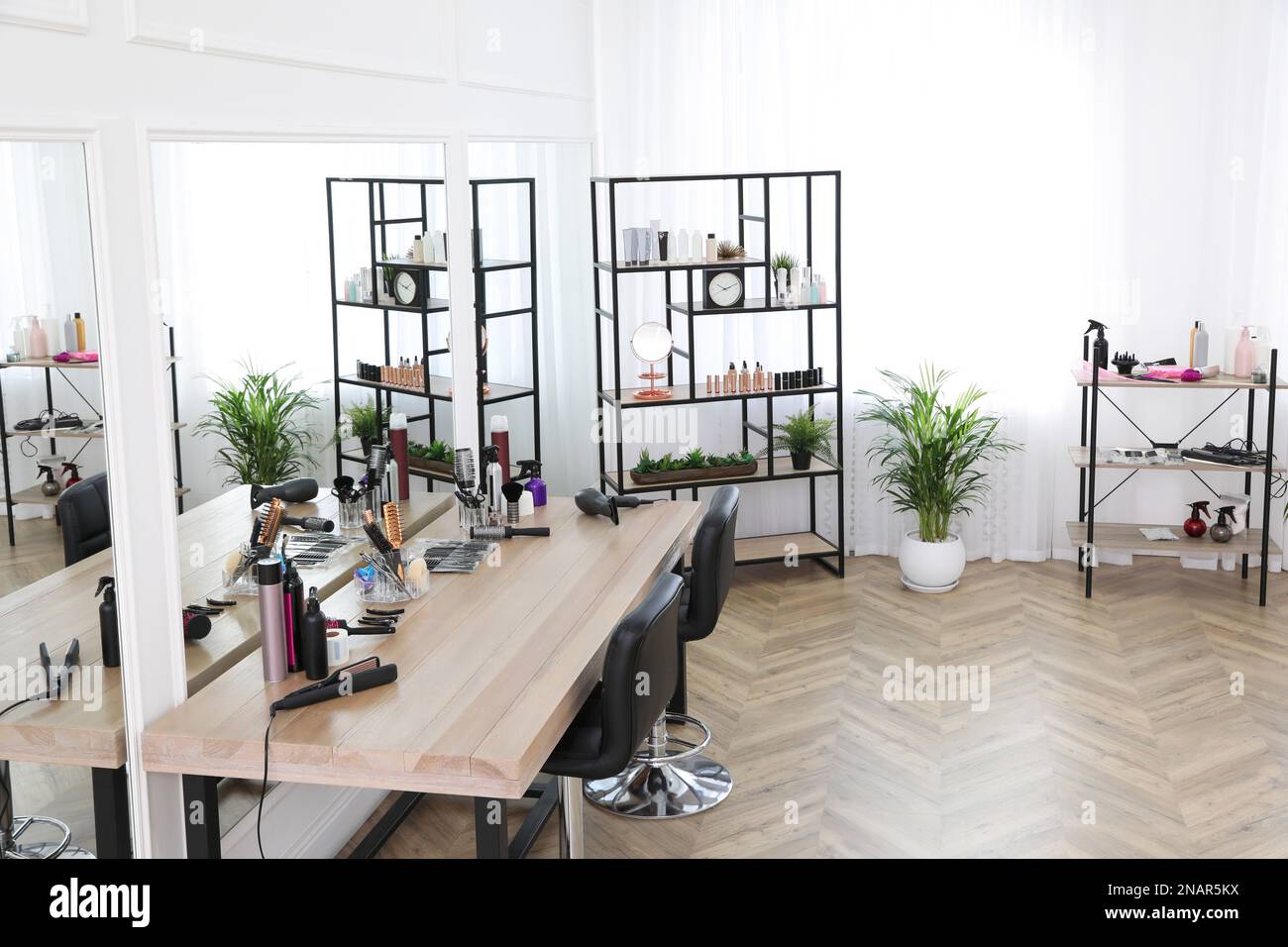 Stylish beauty salon interior with hairdresser's workplace Stock Photo ...