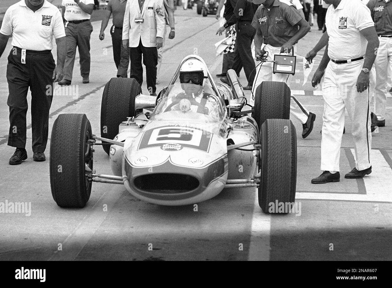 Race car driver Jim Hurtubise, qualified for 64, 500 at speed of 152. ...