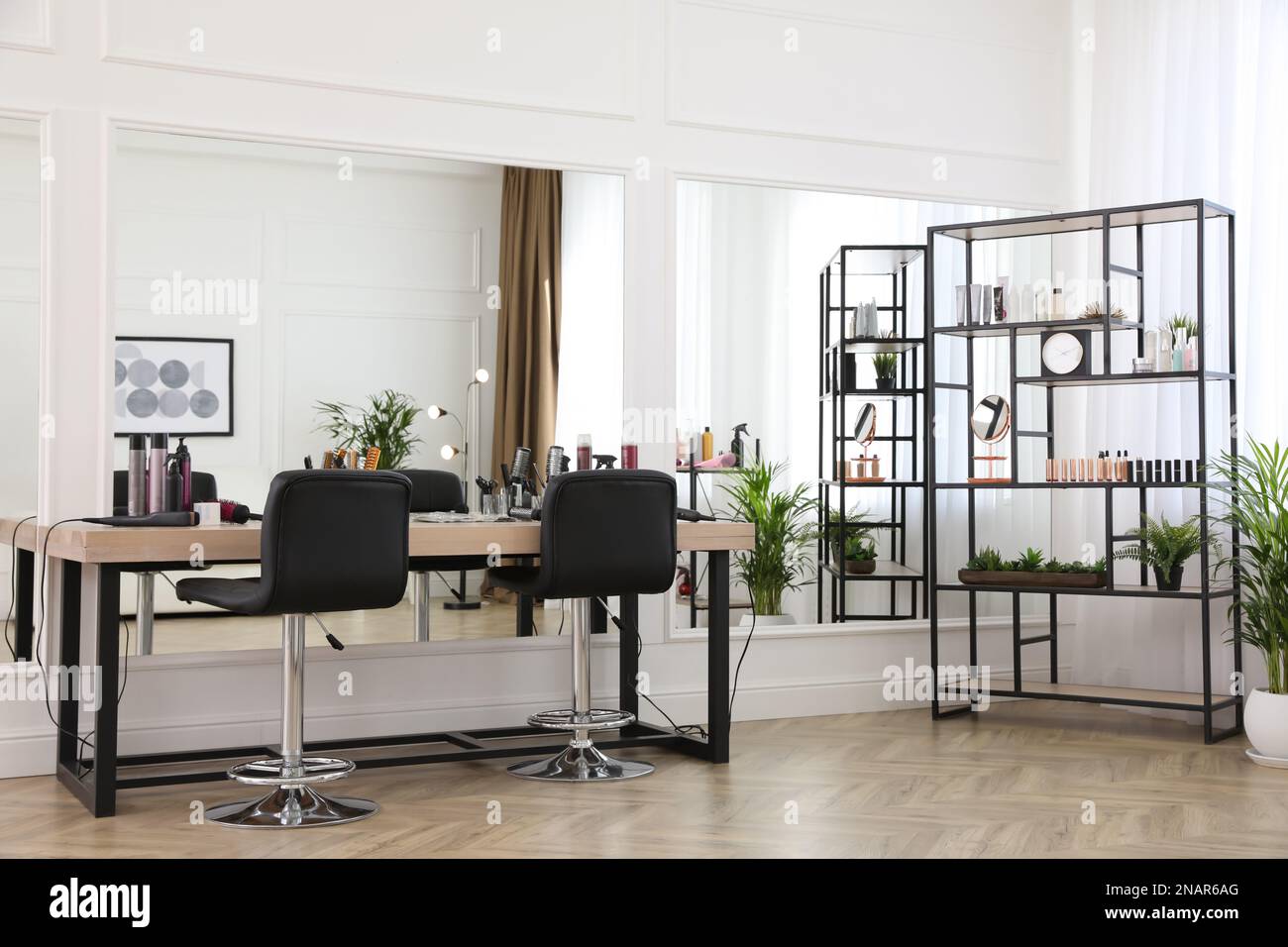 Stylish beauty salon interior with hairdresser's workplace Stock Photo ...