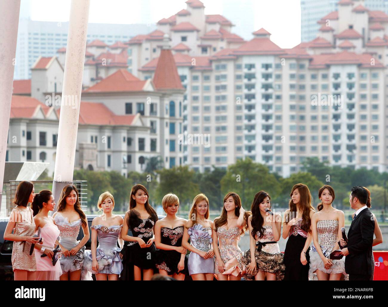 South Korean pop group Girls' Generation arrives on the red carpet at the 2011 Mnet Asian Music ...