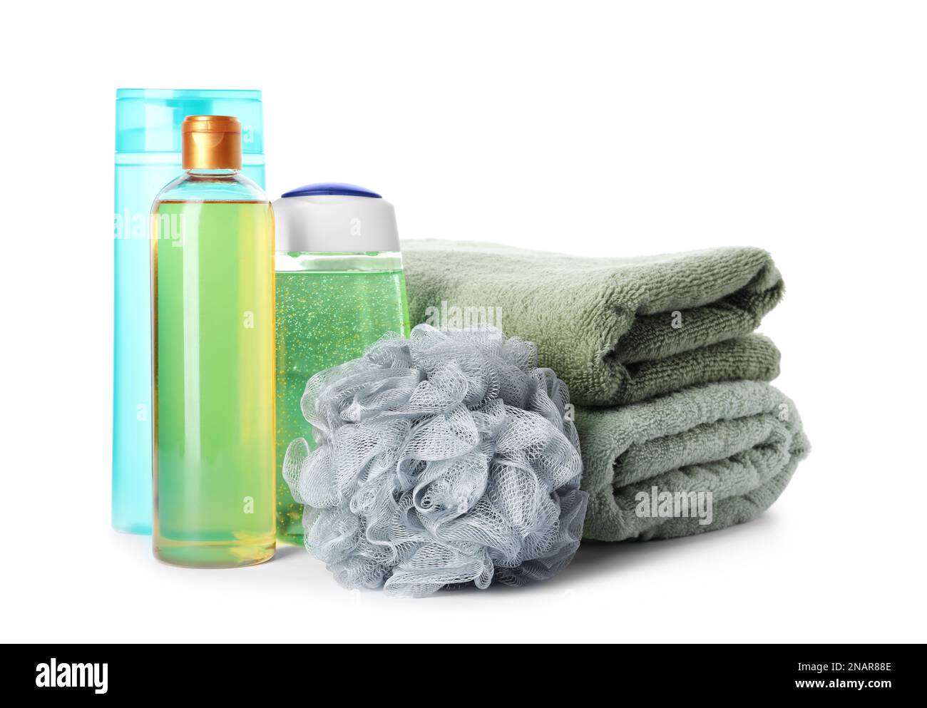 Personal hygiene products with towels and shower puff on white ...