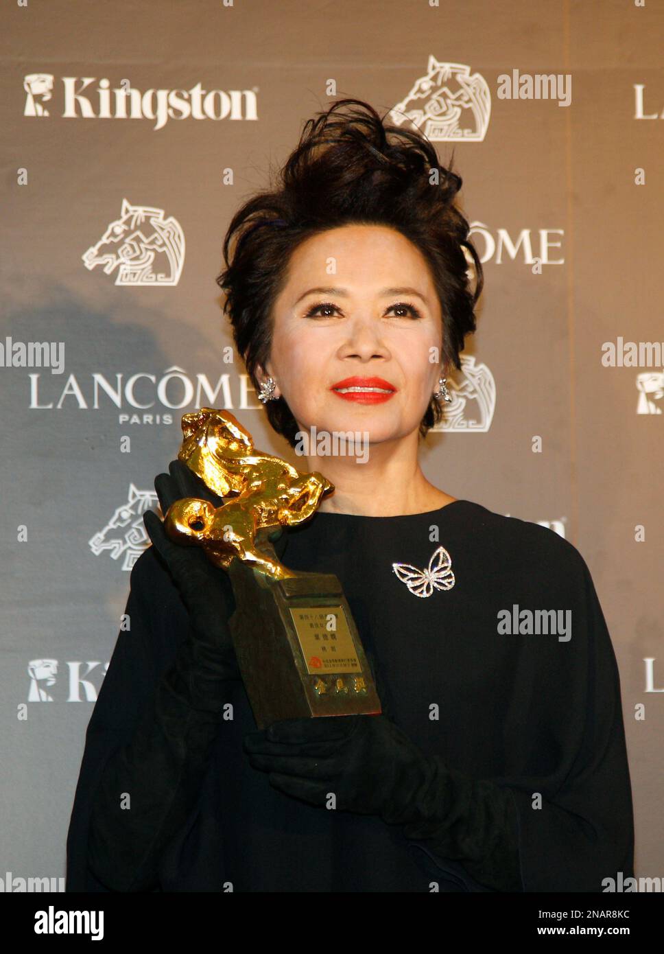 Hong Kong actress Deanie Ip smiles with her award for Best Leading ...