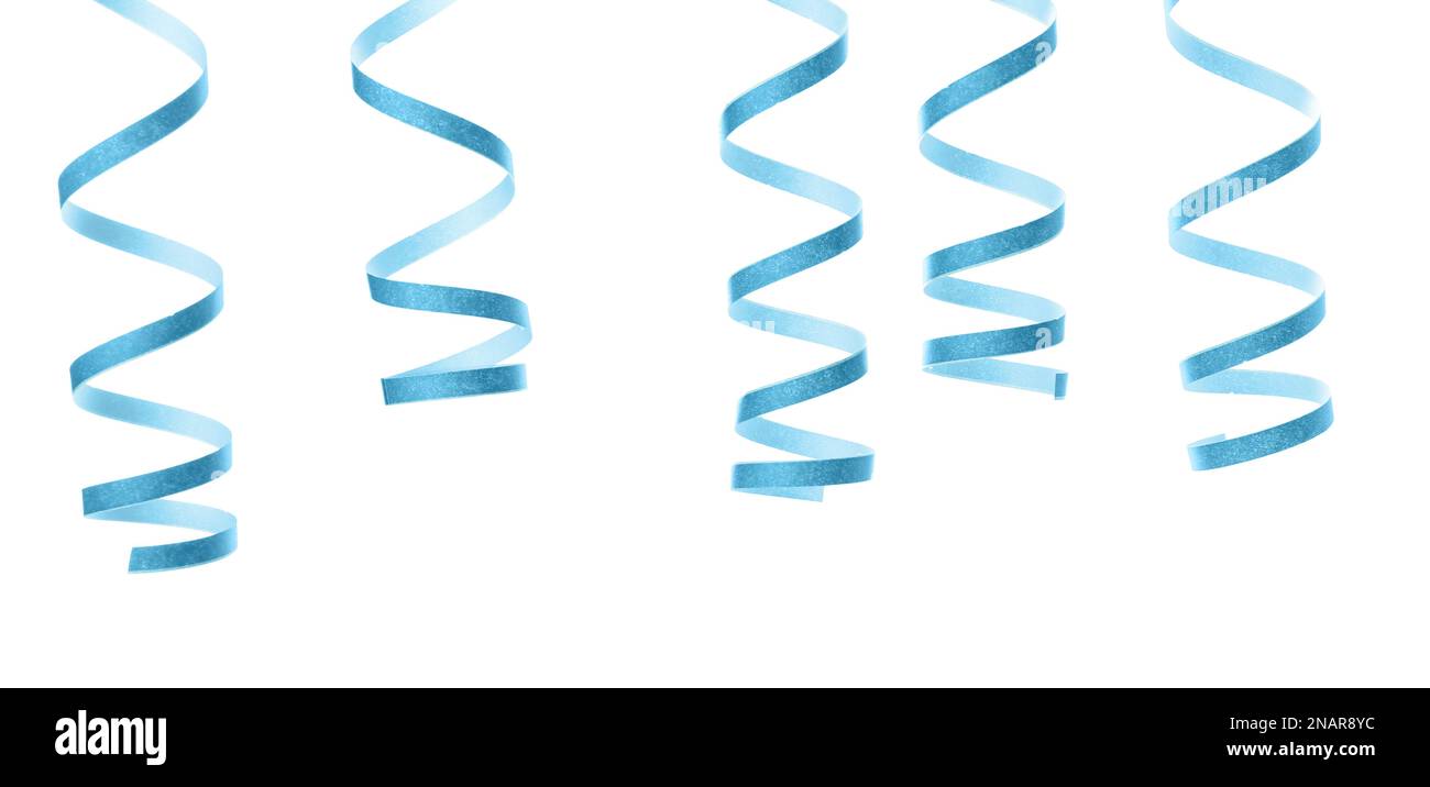 Light blue serpentine streamers on white background. Festive decor ...