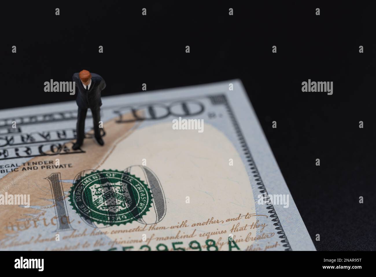 Business and Money Concept. Businessman miniature figure people ...