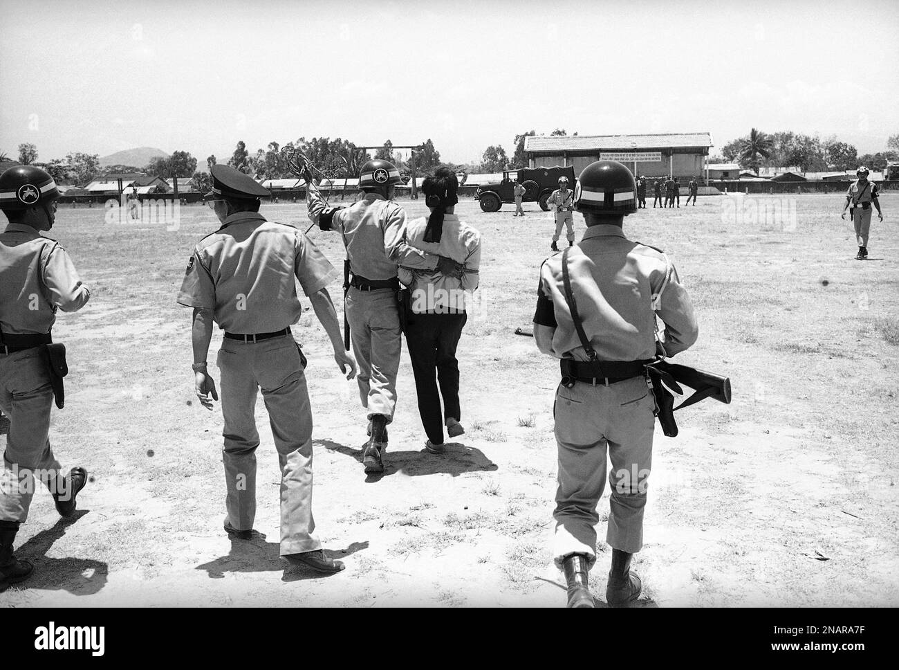Viet Cong terrorist Le Dau, 24, is taken by Vietnamese military ...