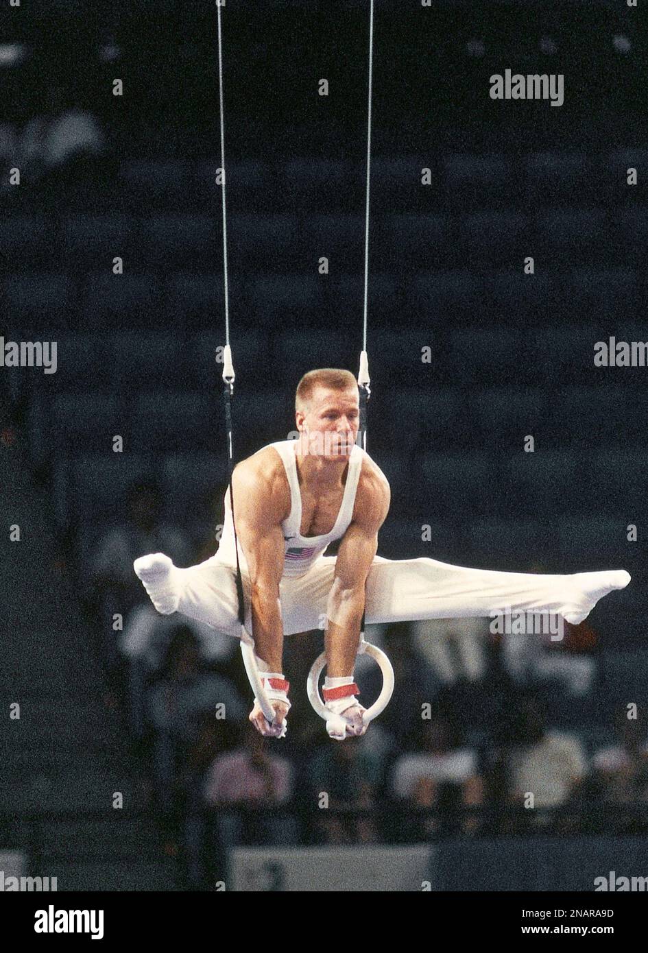 Dan Hayden goes through his routine on the rings at the Olympic trials ...