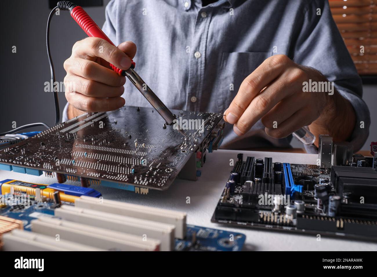 Technician electronic soldering repairing hi-res stock photography and ...